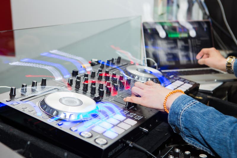 Dj mixes the track stock photo. Image of instrument, disco - 70818088