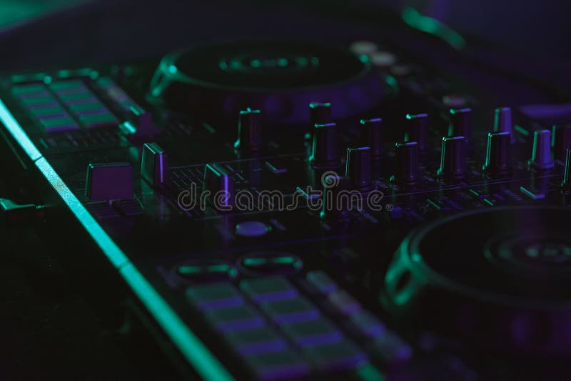 DJ Mixing Deck in Neon Lights Stock Photo - Image of console, crowd ...