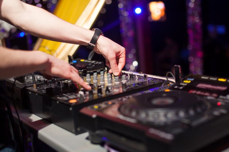 DJ Mixing Music on Console at the Night Club Stock Image - Image of ...