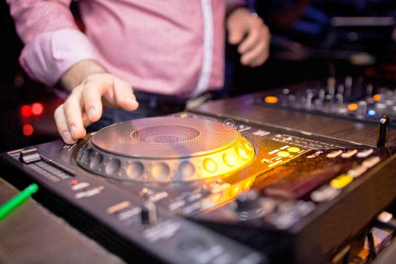 DJ Mixing Music on Console at the Night Club Stock Image - Image of ...