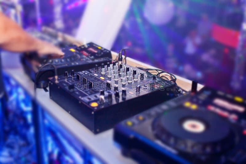 DJ Mixing Music on Console at the Night Club Stock Image - Image of ...