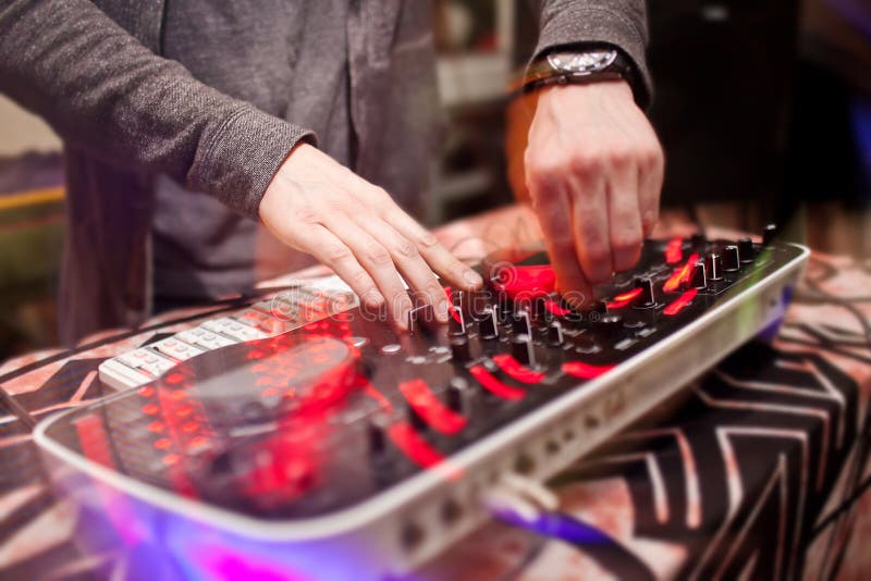 DJ Mixing Music on Console at the Night Club Stock Image - Image of ...