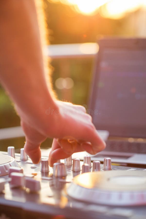 Dj mixing music outdoor. stock photo. Image of headphone - 94808778