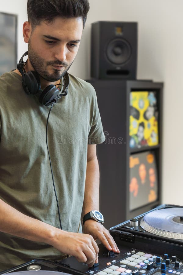 DJ Mixing Sounds in His Home Studio Stock Photo - Image of listening ...