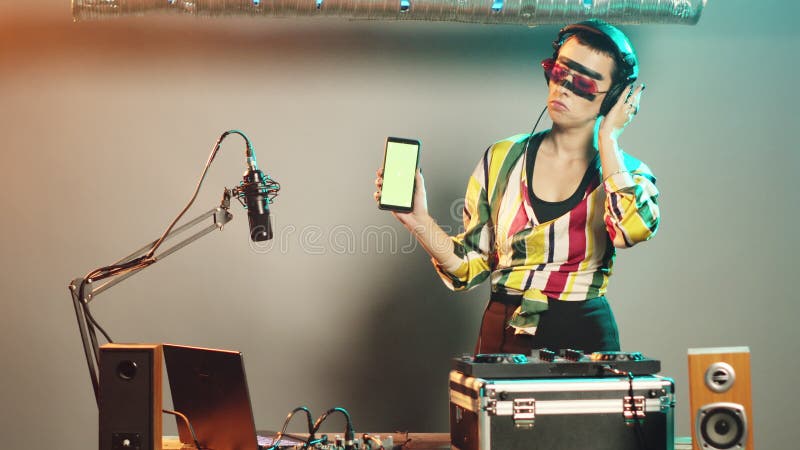 DJ Performer Points at Greenscreen Display Stock Footage - Video of ...