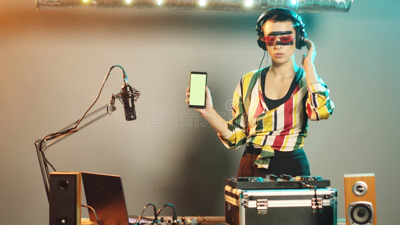 DJ Performer Points at Greenscreen Display Stock Photo - Image of disco ...
