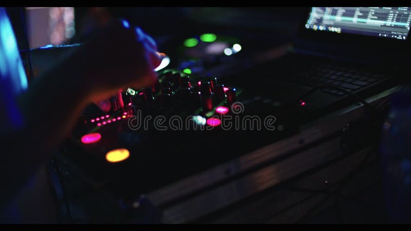 DJ Playing in a Large Trance Party with Large Crowd of People Dancing ...