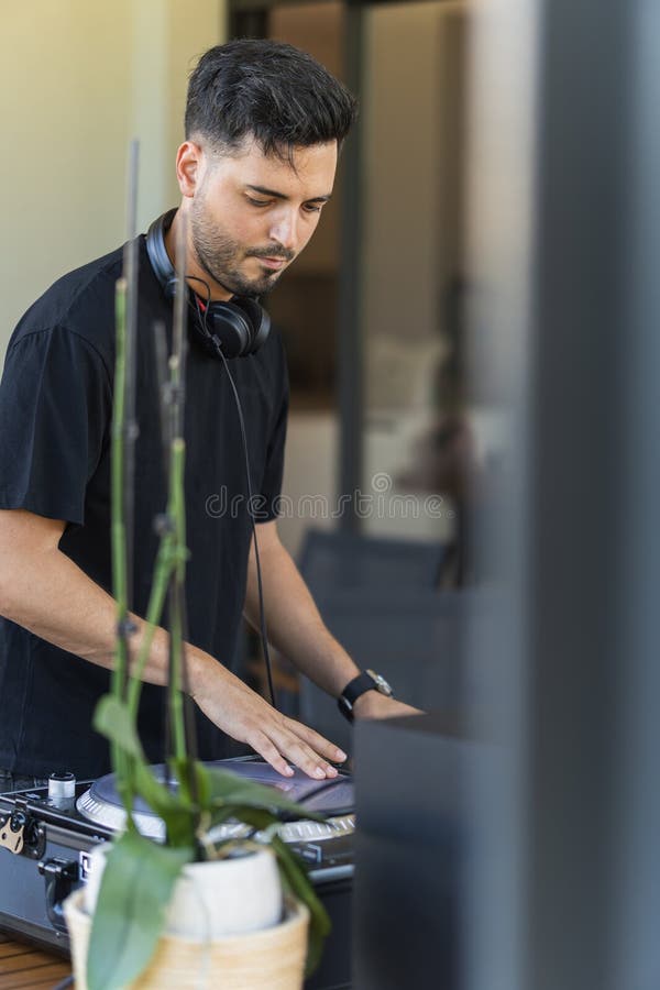 DJ Playing Music Alone in the Garden of His House Stock Image - Image ...