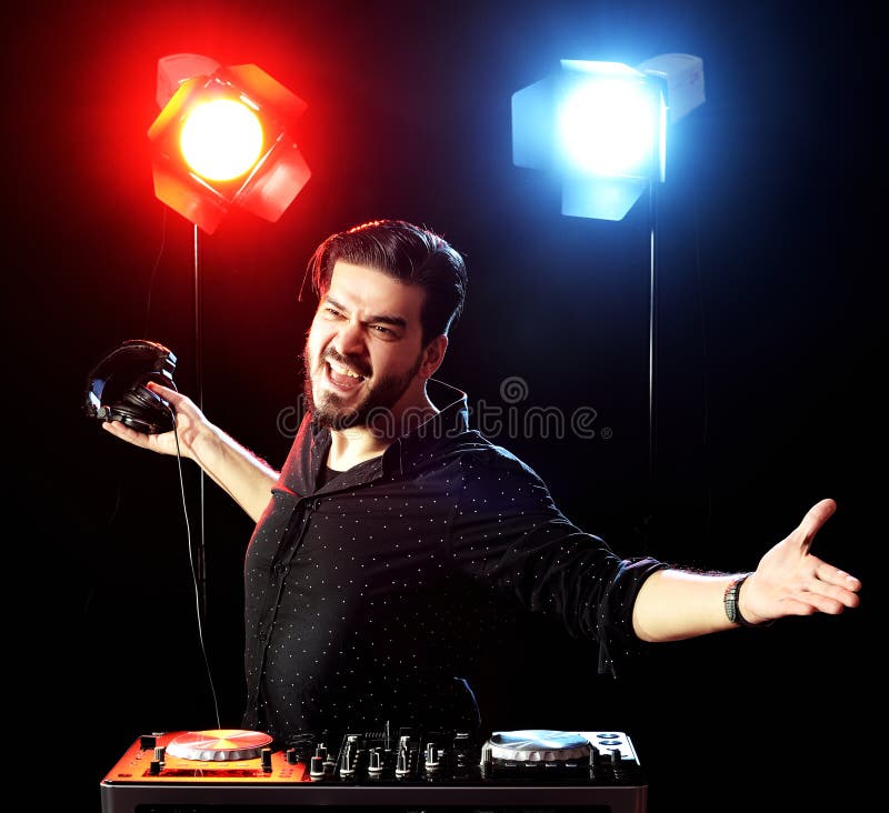 Dj Mixing Music in a Club with Blue and Purple Lights Stock Photo ...