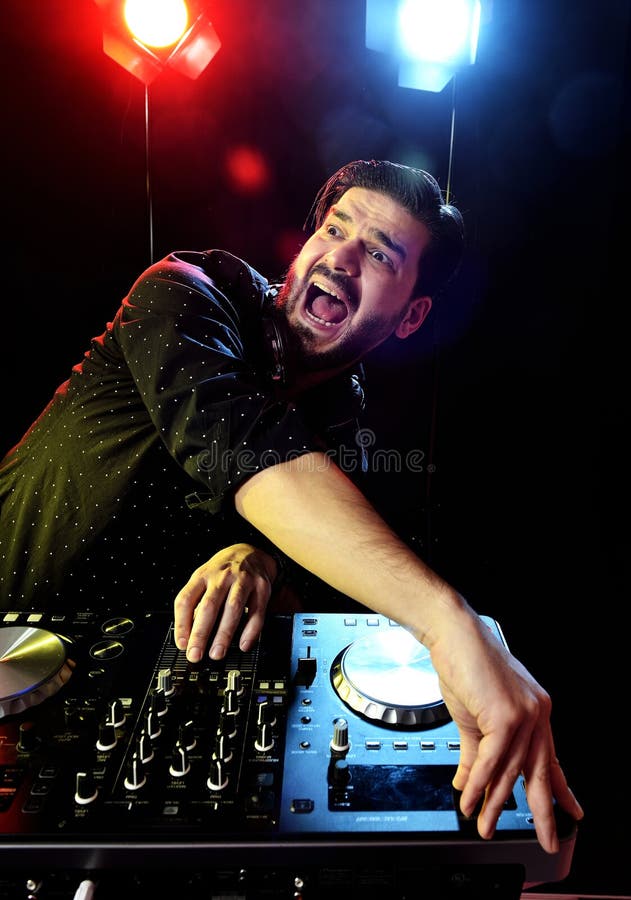 Young DJ in White Costume Holding Vinyl Record in Stock Image - Image ...