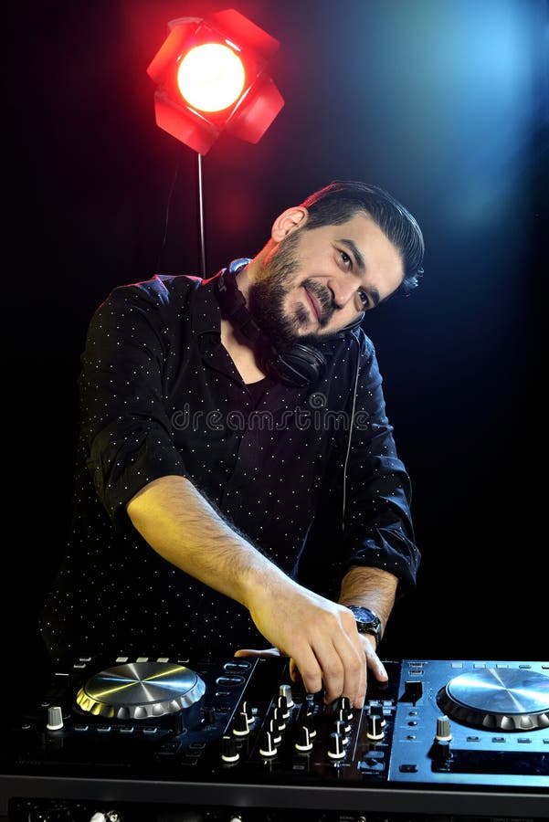 DJ playing music stock photo. Image of headphone, hand - 38682736