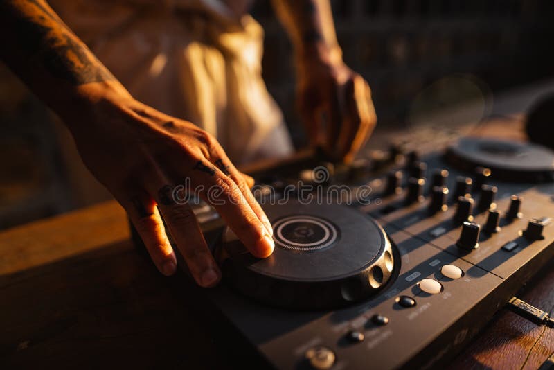 DJ Playing Music,Man Using Mixing Desk at Party Out in the Evening ...