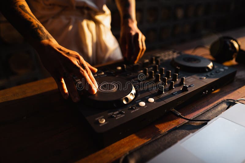 DJ Playing Music,Man Using Mixing Desk at Party Out in the Evening ...