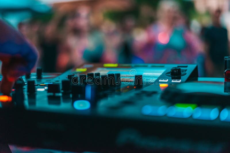 Dj Plays Disco Music with His Consolle in a Pub Stock Photo - Image of ...