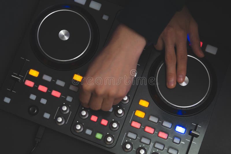 DJ Plays Music. Sound Mixer Controller with Knobs and Sliders. Hands on ...