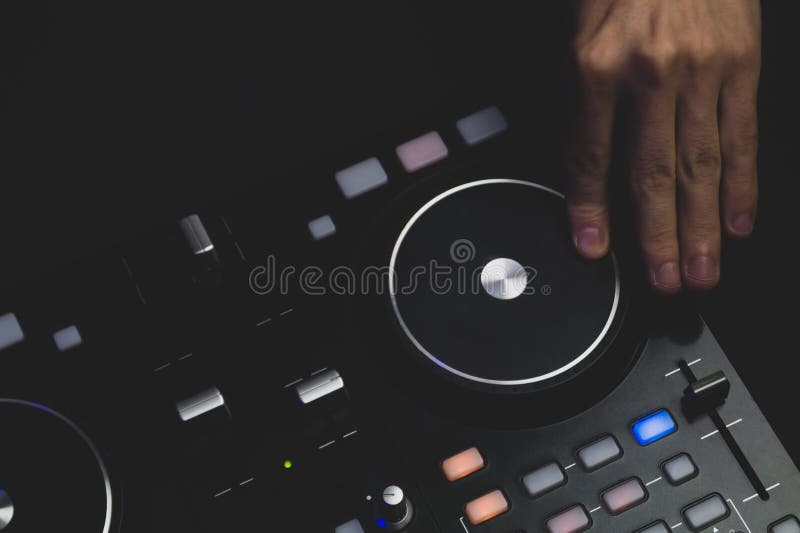 DJ Plays Music. Sound Mixer Controller with Knobs and Sliders. Hands on ...