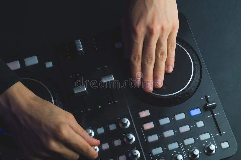 DJ Plays Music. Sound Mixer Controller with Knobs and Sliders. Hands on ...