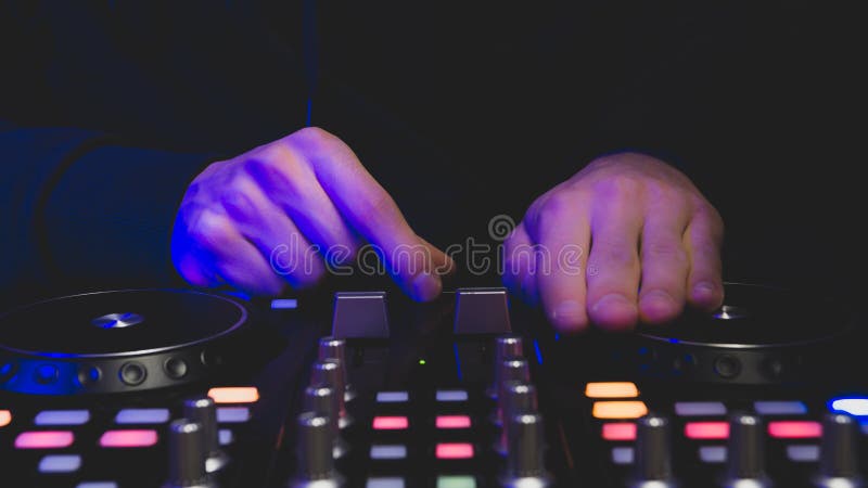 DJ Plays Music. Sound Mixer Controller with Knobs and Sliders. Hands on ...