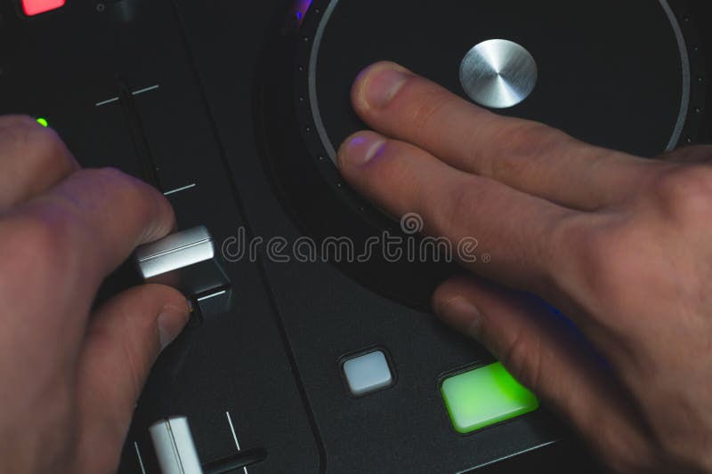DJ Plays Music. Sound Mixer Controller with Knobs and Sliders. Hands on ...