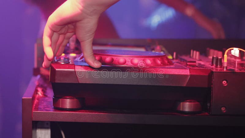 A DJ Presses Buttons on a Professional Music Control Panel in a ...