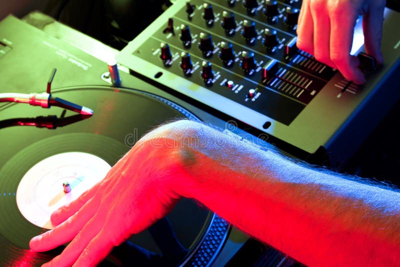 DJ Scratching Records in Club Environment Stock Photo - Image of dance ...