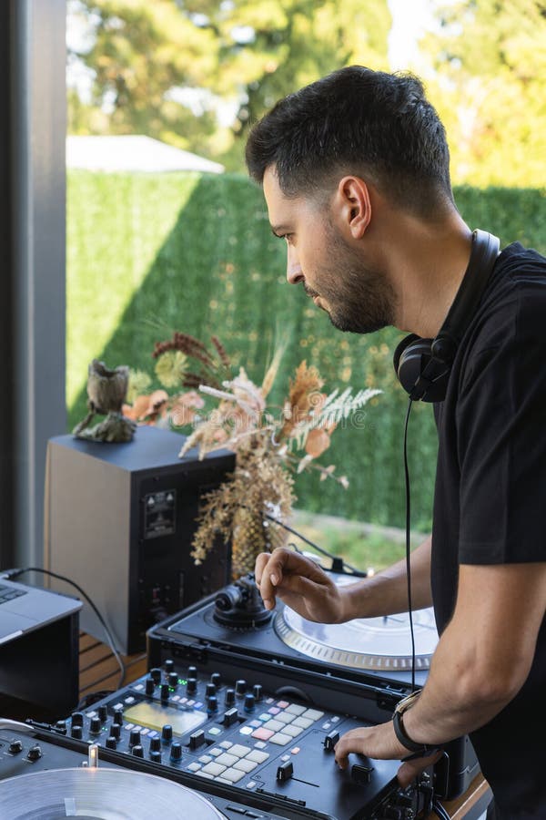 DJ Setting Up the Mixing Console before Starting the Concert Stock ...