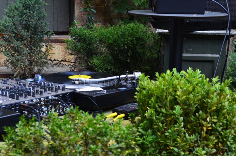 Turntable DJ Setup Outdoors Amidst Greenery Stock Image - Image of ...