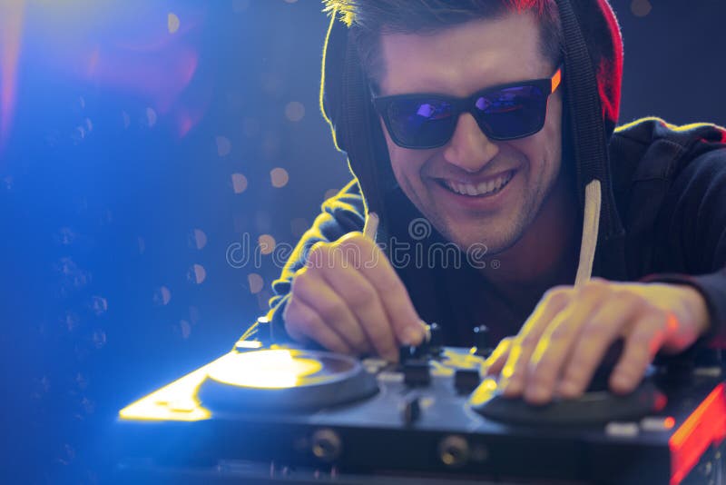 Dj working at nightclub stock image. Image of control - 90307087