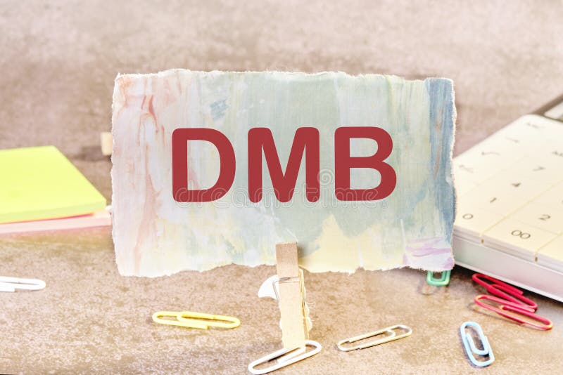 Dmb Text on a Piece of Colored Paper Held by a Clothespin Next To ...