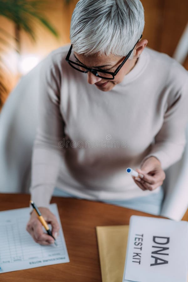 DNA Kit Test at Home stock photo. Image of package, woman - 210294656
