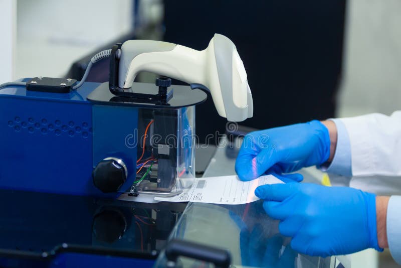 DNA Laboratory. the Expert Puts the Human DNA into the Database Using ...