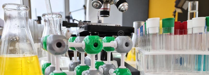 DNA Molecule in Test Tubes and Microscope in Laboratory Stock Image ...