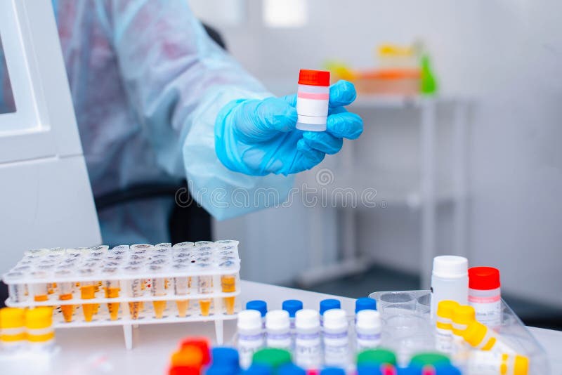Dna Test in the Lab. Dispenser with Blood and Test Tubes Close-up Stock ...