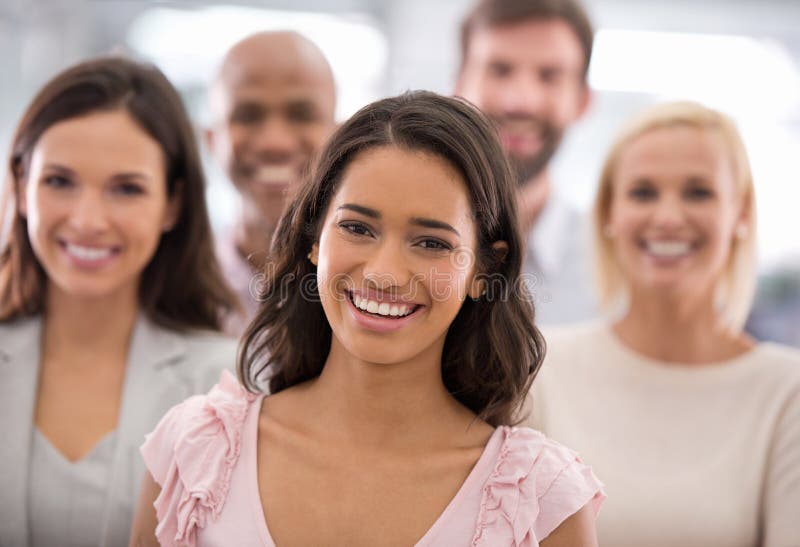 We Do Business with a Smile. a Group of Smiling Businesspeople. Stock ...