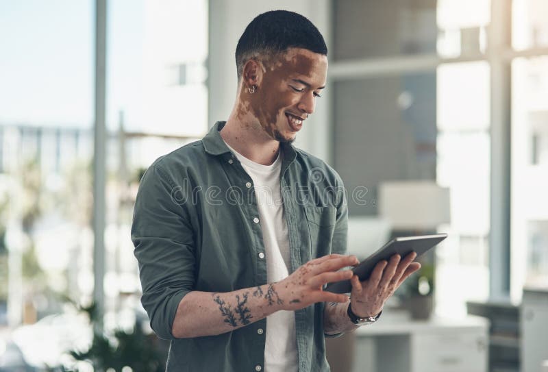 Do the Common Thing Uncommonly Well. a Young Business Man Using a ...