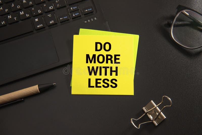 Do More with less. Text on White Notepad Paper on Light Background Near ...