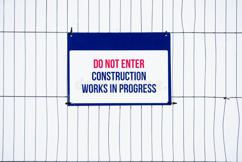 Do Not Enter Construction in Progress Sign on Fence Stock Photo - Image ...