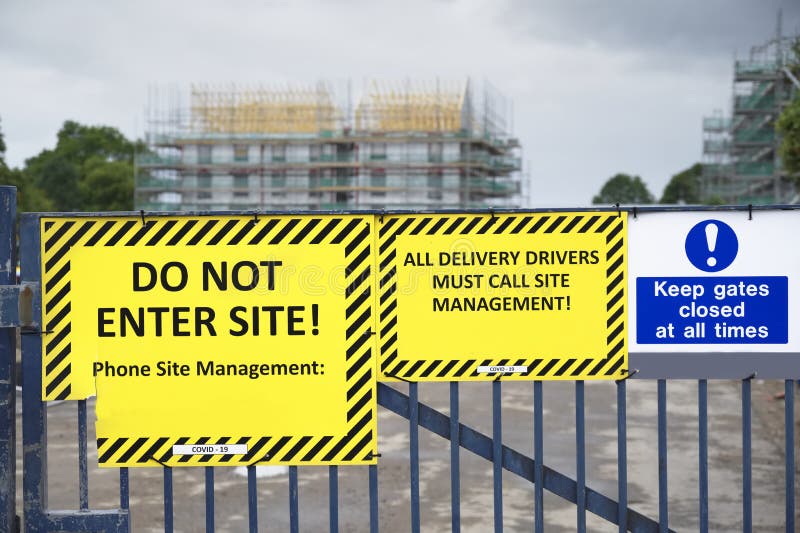 Do Not Enter Construction in Progress Sign on Fence Stock Photo - Image ...