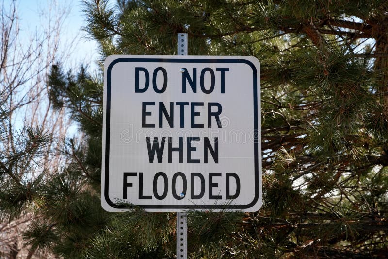 "Do Not Enter when Flooded" Sign Stock Image - Image of gate, danger ...