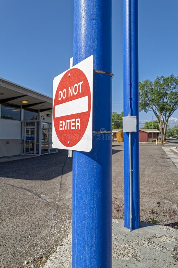 A Do Not Enter Sign on a Blue Pole Stock Image - Image of post, block ...