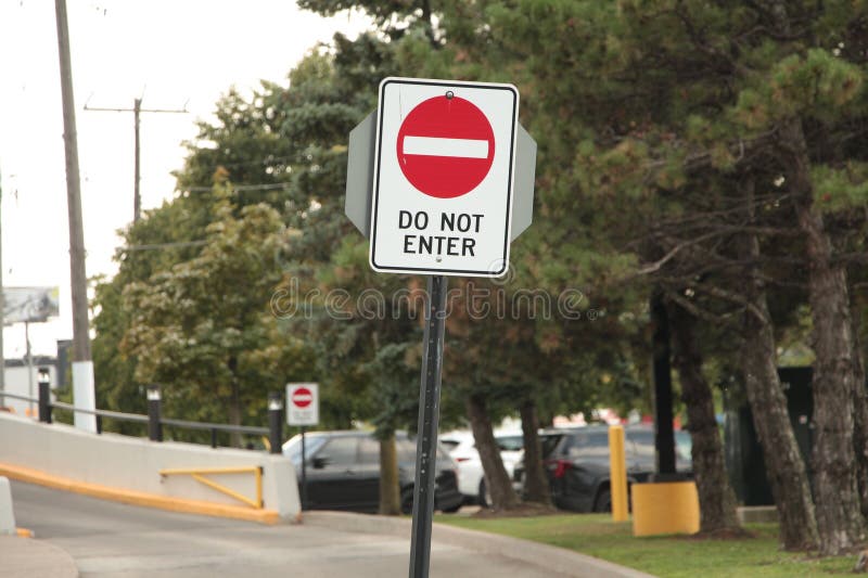 Do Not Enter Vertical Rectangle Sign Symbol on Post with Ramp Behind ...