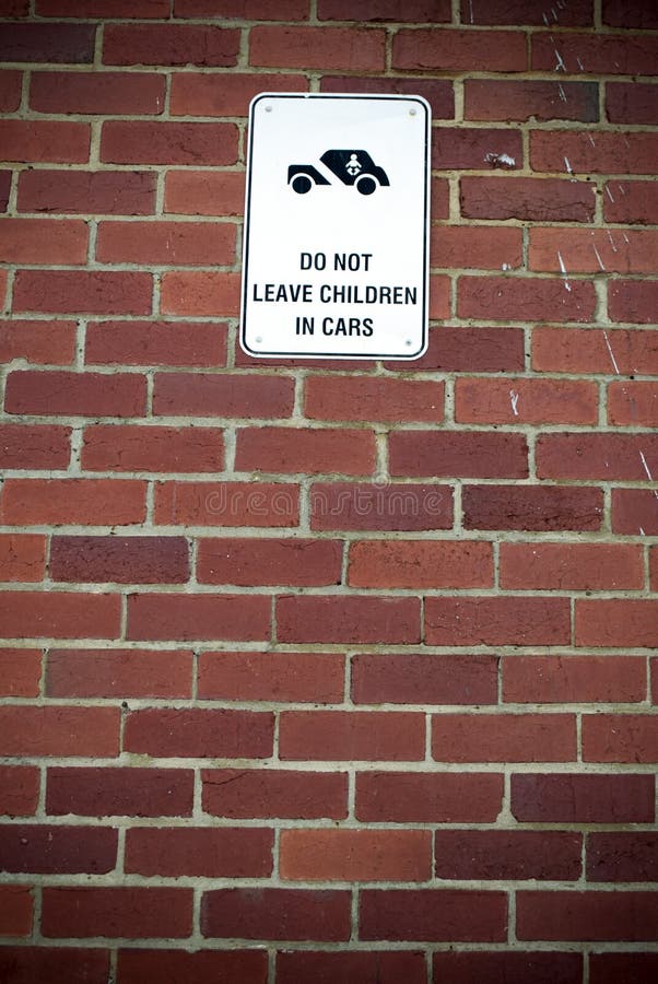 Do Not Leave Child in Car Sign Stock Photo - Image of wall, signage ...