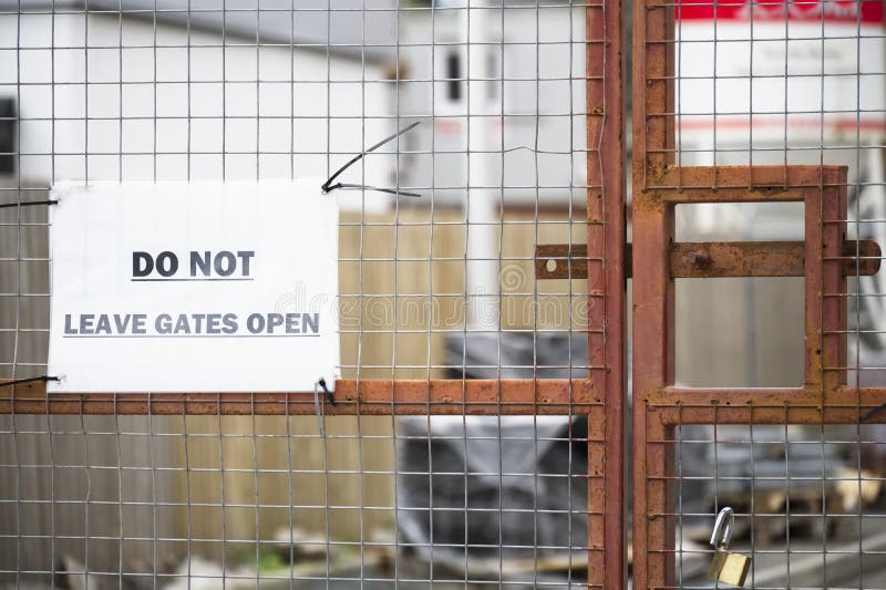 Do Not Leave Gates Open Sign at Construction Site Stock Image - Image ...