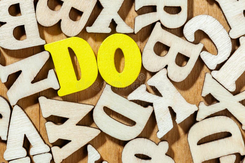 Do Word by Yellow Wooden Letters Stock Photo - Image of childhood ...