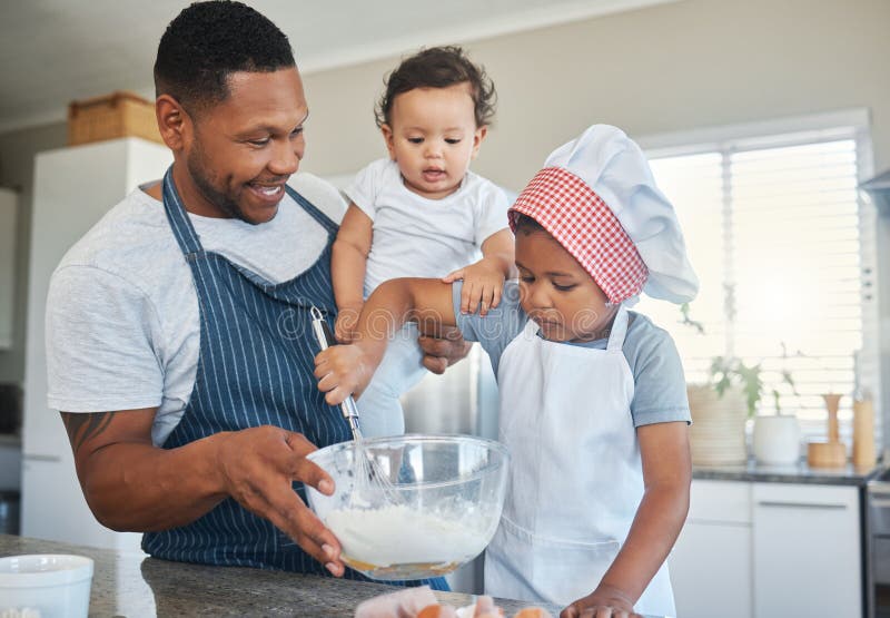 Do You Think we Can Bake this Cake. a Father Baking at Home with His ...