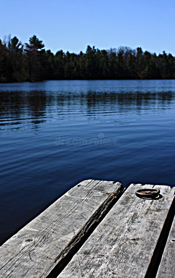 Cottage Dock on Lake stock image. Image of relaxation - 20184363