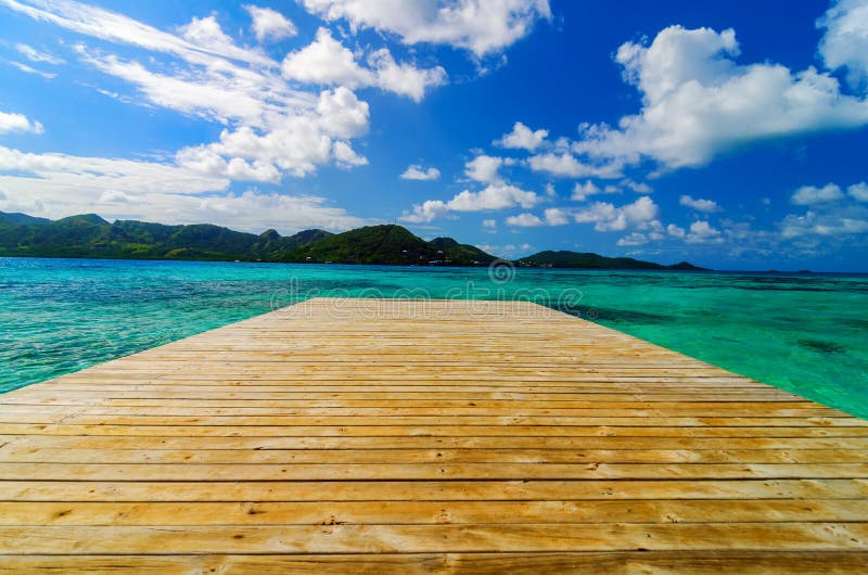 Dock in Turquoise Water stock photo. Image of paradise - 28844978
