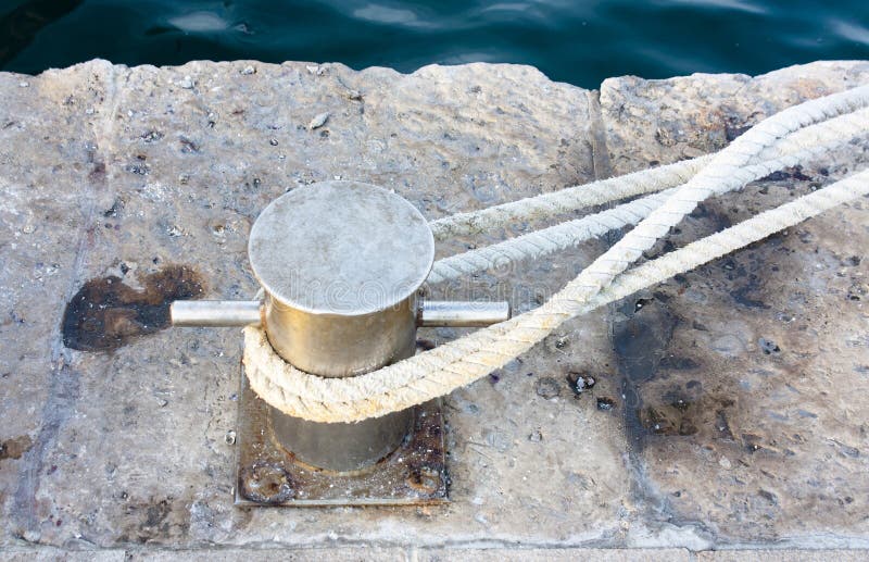 Dock Bollard on the Stone Pier Stock Photo - Image of industry, marine ...