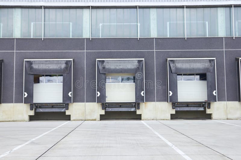 Loading Dock Bay Doors stock image. Image of loading - 84309771