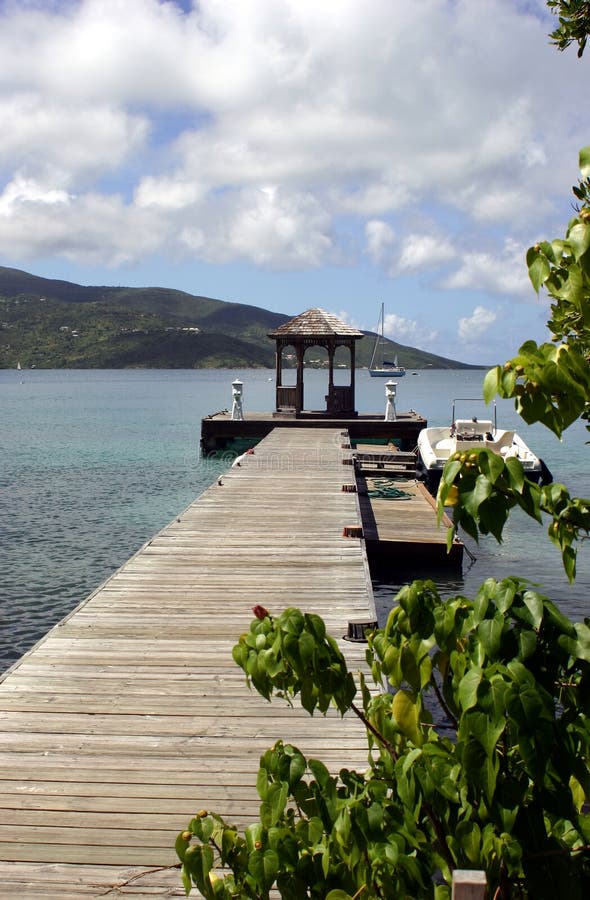 Dock at island resort stock image. Image of mountains - 6606381